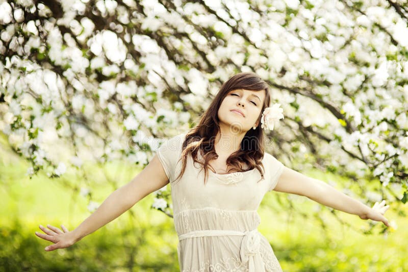 Happy Woman Enjoying Spring, Nature, Falling Petal Stock Image - Image ...