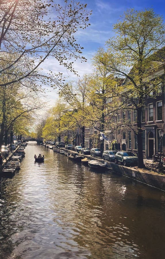 Spring in Amsterdam stock photo. Image of buildings - 246522386
