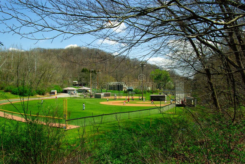 Spring Baseball stock image. Image of team, grass, fence - 20844975