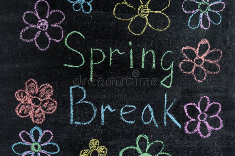 Spring Break with Flowers Written in Colorful Chalk on Black Chalkboard ...