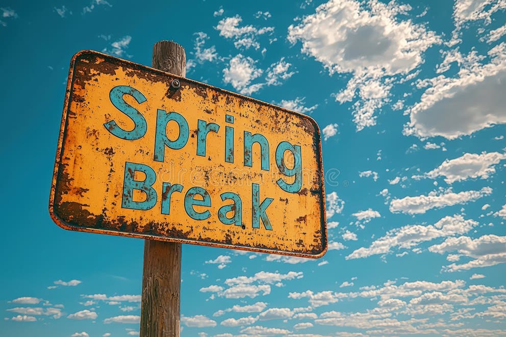Spring Break Sign Against Bright Blue Sky with Fluffy Clouds Stock ...