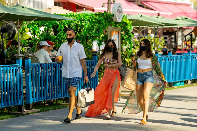 Spring Breakers in Miami Beach FL Walking on Ocean Drive Editorial ...