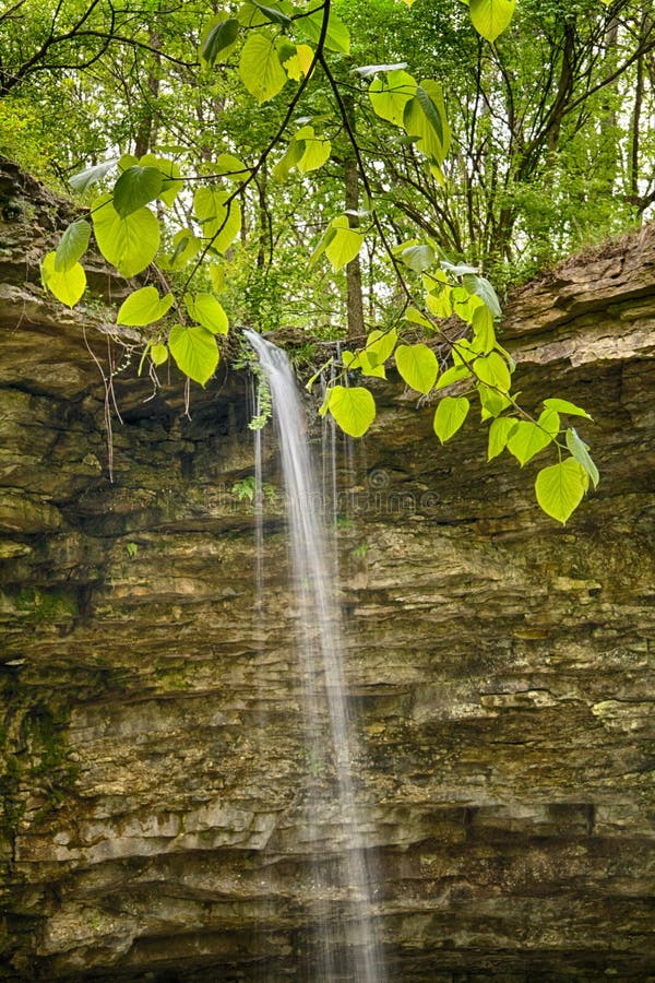 Spring Cascade Flowing Over a Rock Ledge Stock Photo - Image of river ...