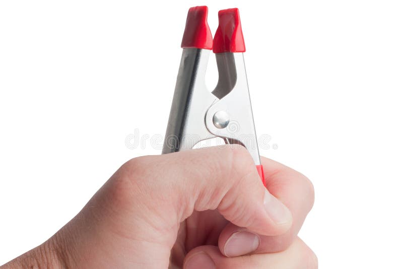 Spring clamp in hand stock image. Image of fastener, hand - 16371089