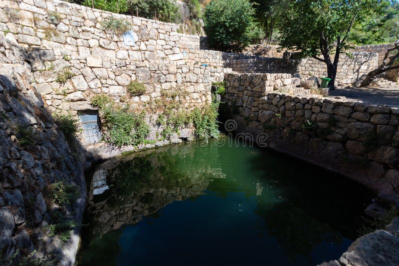 A Spring of Clear Water and an Ancient Laundromat. Stock Image - Image ...