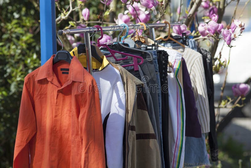 Spring clothes garage sale stock image. Image of clothing - 31599139