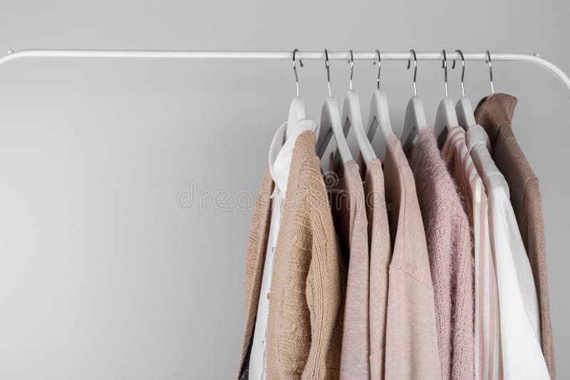 Spring Clothes Hanging on a Rack Stock Photo - Image of jumper ...