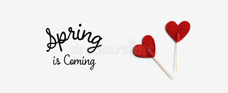 Spring is Coming Message with Red Glitter Heart Picks Stock Photo ...
