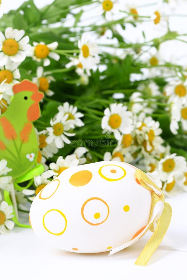 Daisies and Easter eggs. stock image. Image of background - 65568397