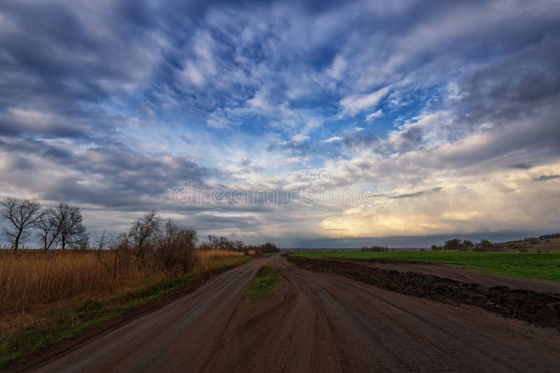 Spring Country Road after Rain, Countryside. Clouds and Sky Stock Image ...