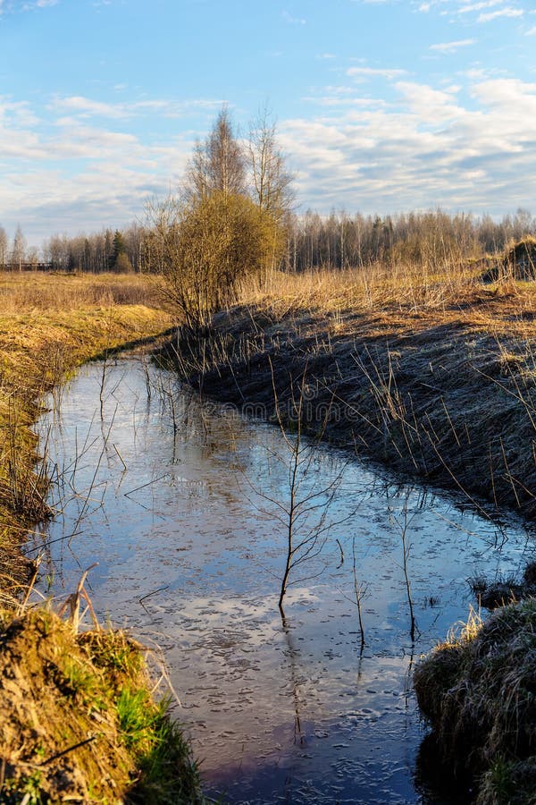 Spring creek after frost stock image. Image of cloud - 93143887