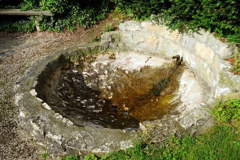 Spring with drinking water stock photo. Image of tube - 77173364