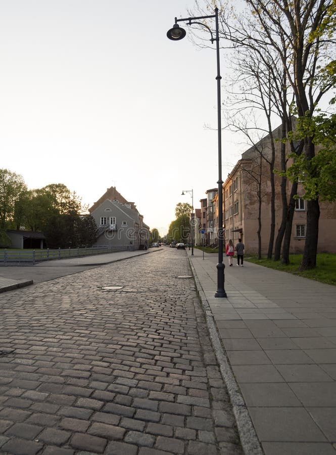 Spring Evening at the Cobbled Street of Klaipeda, Lithuania Editorial ...