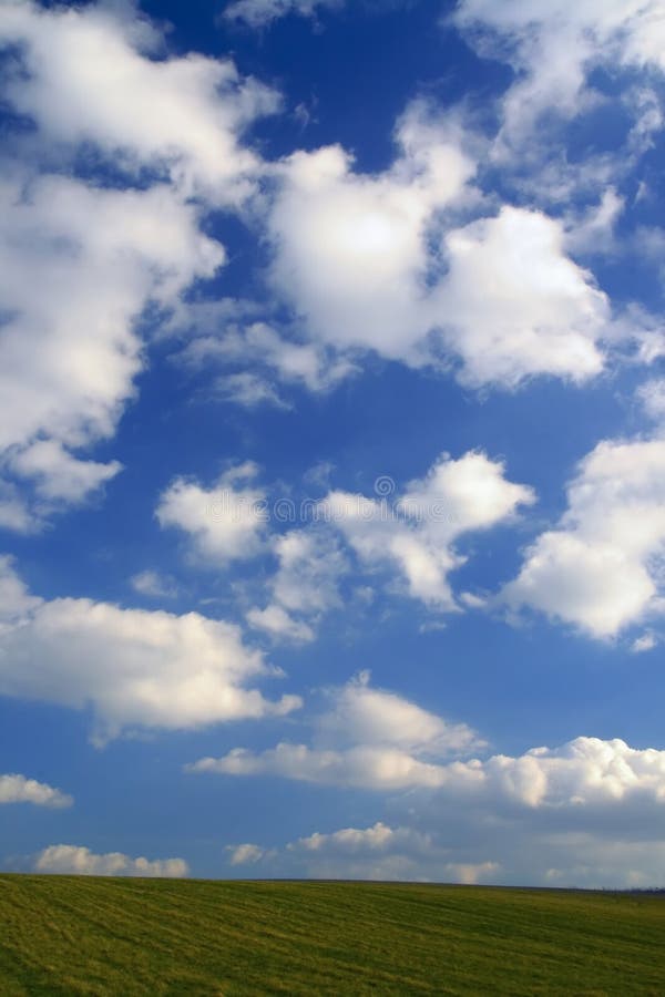 Spring field and clouds stock photo. Image of countryside - 4450536
