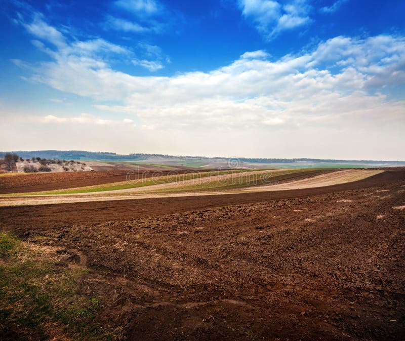 Spring Field Soil and Hills Landscape in the Background Stock Image ...
