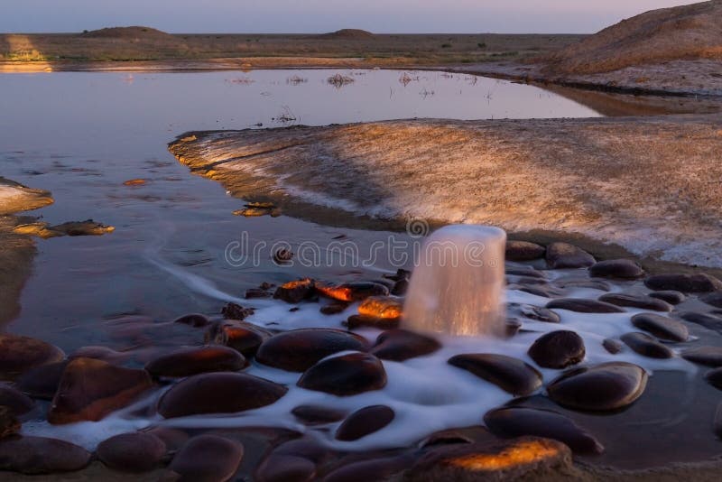 Spring of Fire Water. Burning Methane in Water Stock Photo - Image of ...