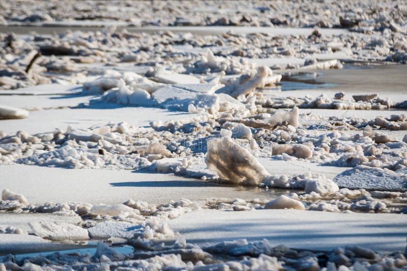 Spring Floods. Sedimentation of Ice Blocks in a River that Forms an Ice ...