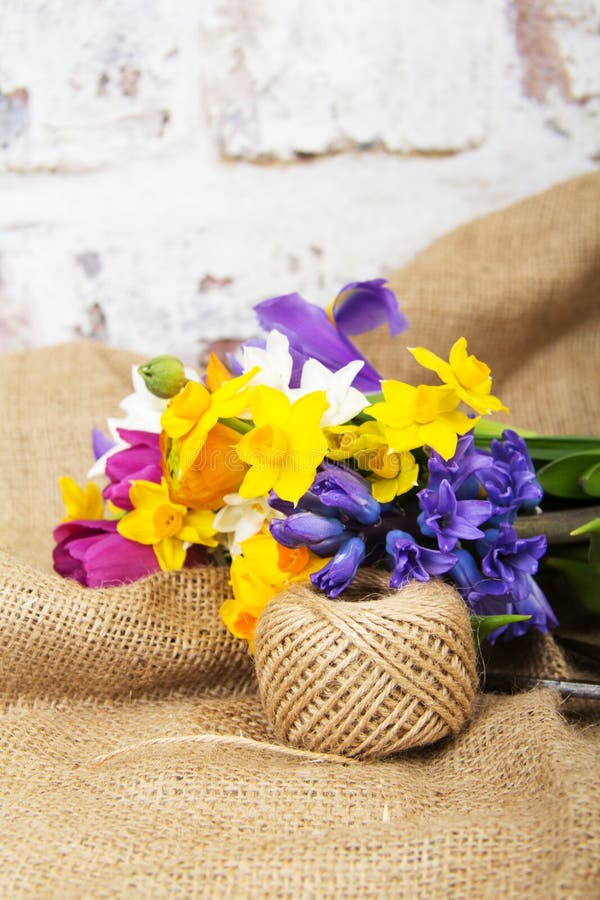 Spring Flower Arrangement Against a Rustic Background Stock Image ...