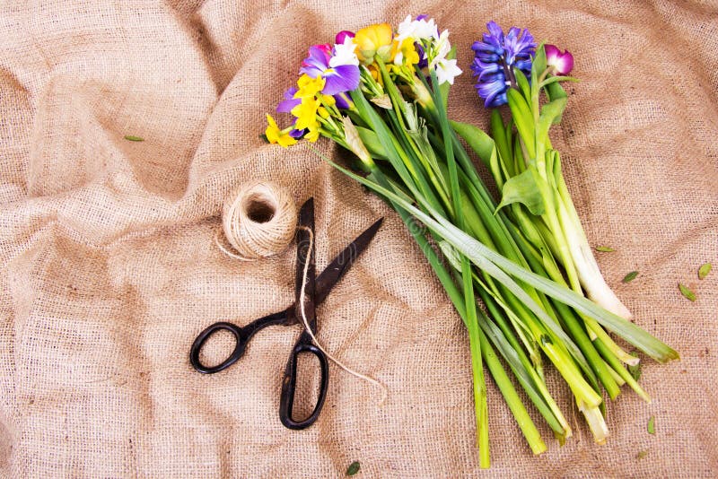 Spring Flower Arrangement Against a Rustic Background Stock Image ...