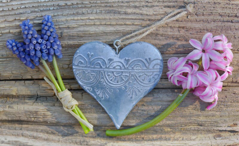 Spring Flowers and Iron Heart Stock Image - Image of heart, celebration ...