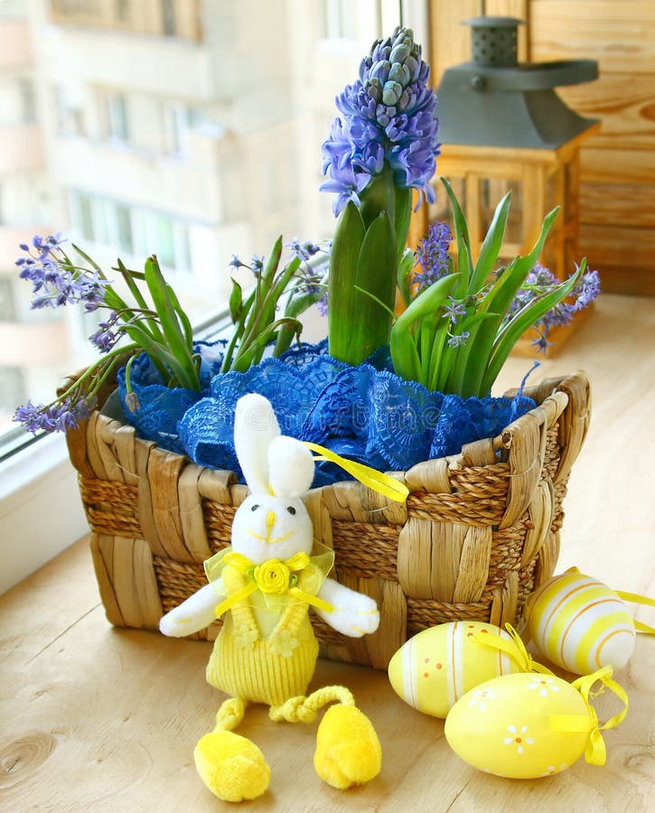 Spring Flowers in a Small Basket and Easter Rabbit Stock Image - Image ...