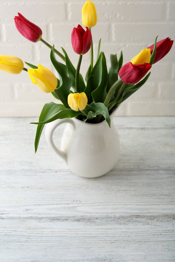 Spring Flowers in White Pitcher Stock Image - Image of bright, tulip ...