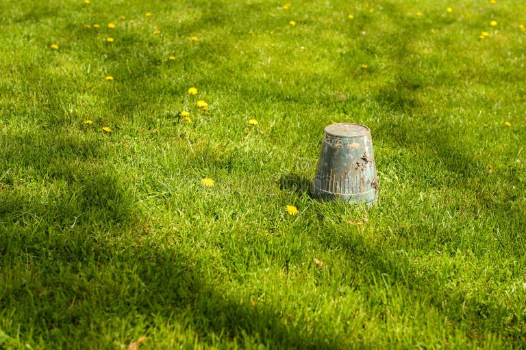 Spring Gardening - Overturned Pot Upside Down in Grass, Copyspac Stock ...