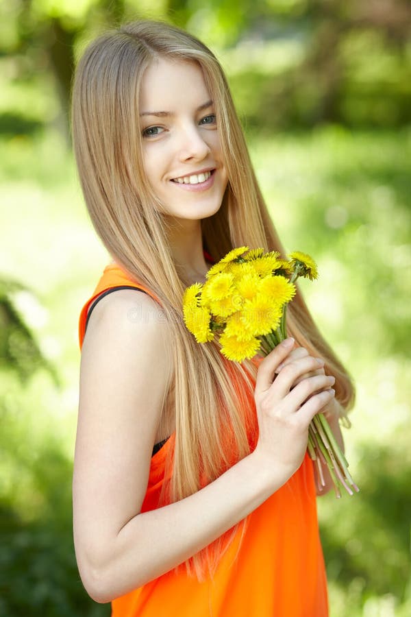Spring Girl with Bunch of Dandelions Stock Photo - Image of happiness ...