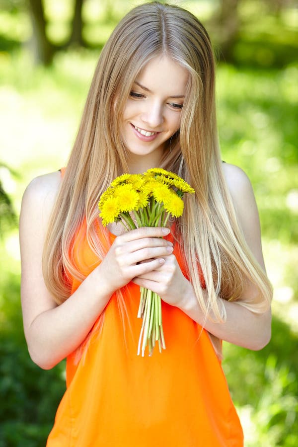 Spring Girl with Bunch of Dandelions Stock Photo - Image of outdoors ...