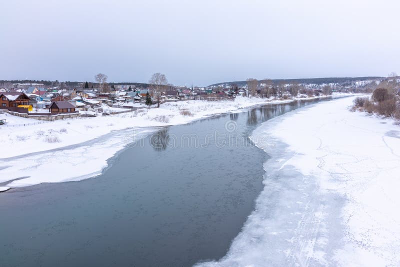 The Spring River in the Village Began To Thaw from the Ice.the Ice in ...