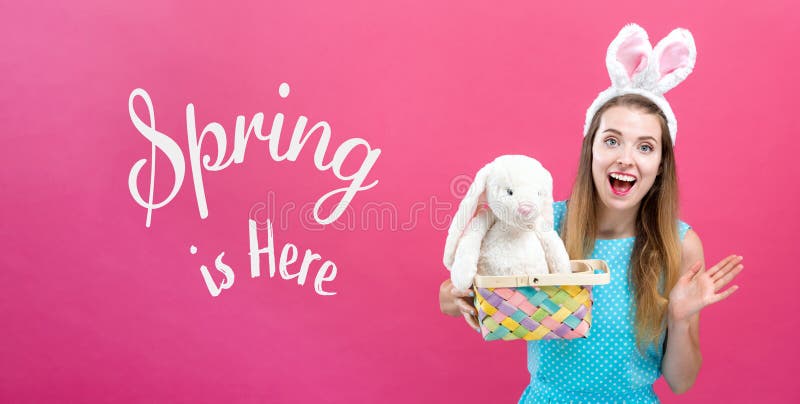 Spring is Here Message with Woman with Easter Basket Stock Photo ...