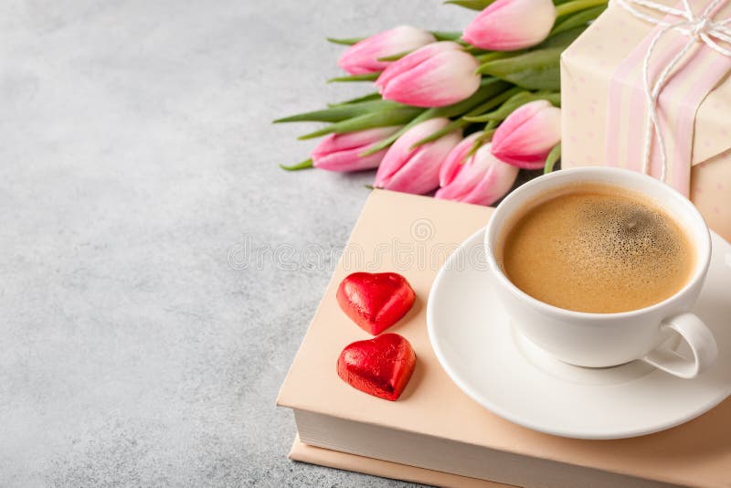Spring Holiday Concept. Coffee, Book, Tulips and Gift Box Stock Photo ...