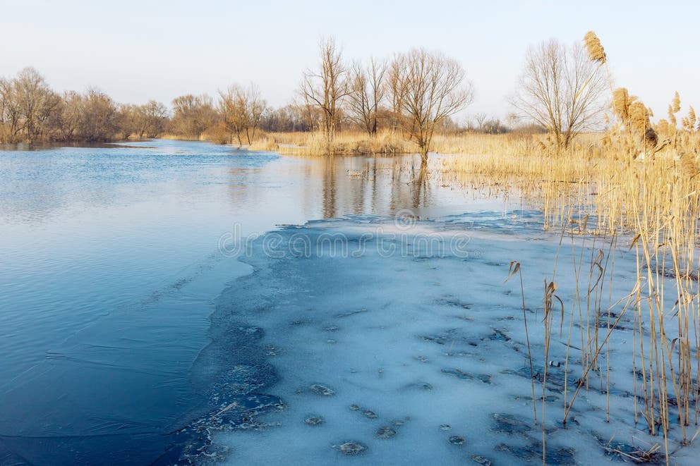 The Spring Ice is Melting on the River. Spring Flood, River with Ice ...
