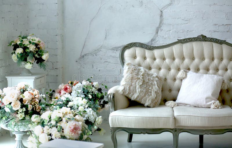 Spring Interior in Studio with Flowers and a Classic Sofa Stock Image ...