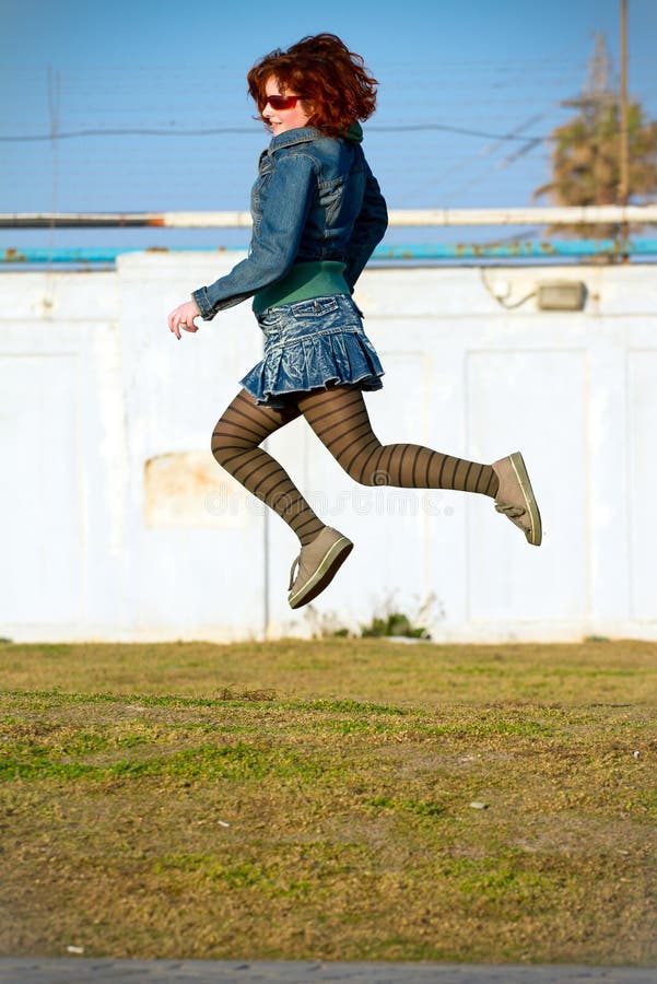 Spring jump stock photo. Image of jeans, clothing, expressions - 24063154