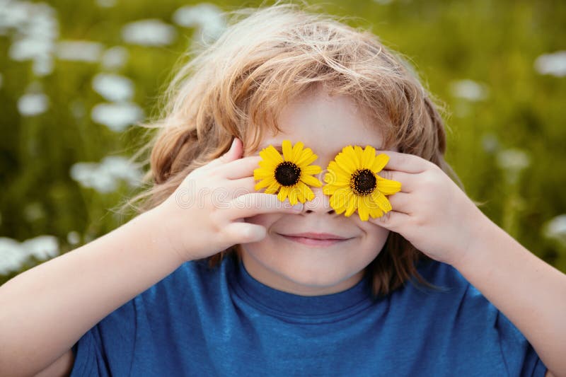Spring Kid. Funny Little Boy with Daisy in Eyes. Stock Photo - Image of ...