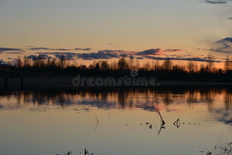 Spring Landscape with Dramatic after-sunset Sky Reflected in the Water ...