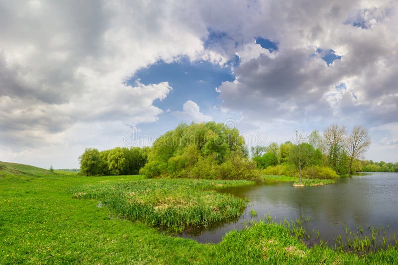 Spring Landscape with Lake, Meadow, Forest and Sky with Clouds Stock ...