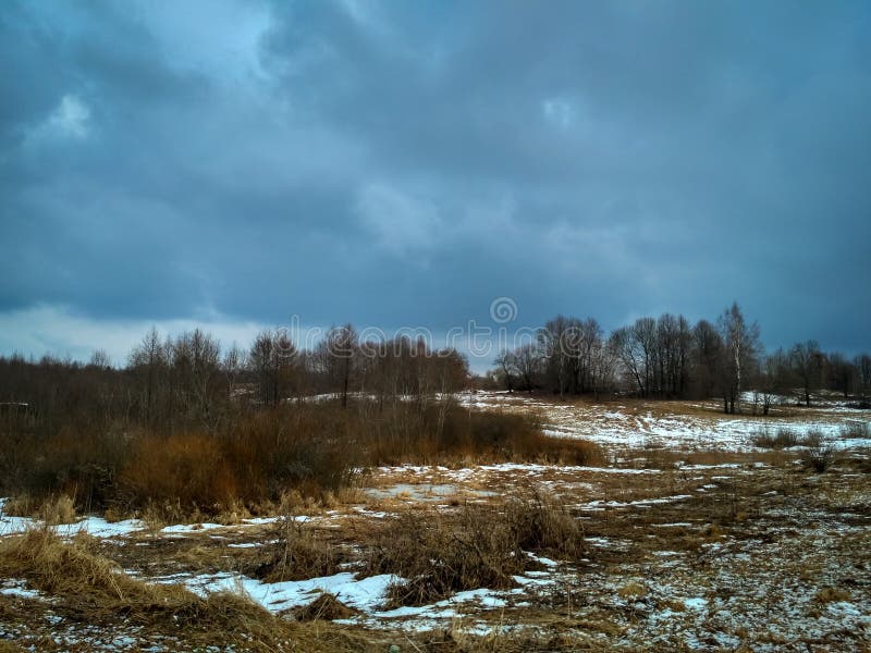 Spring Landscape with Melting Snow and Clouds Stock Image - Image of ...
