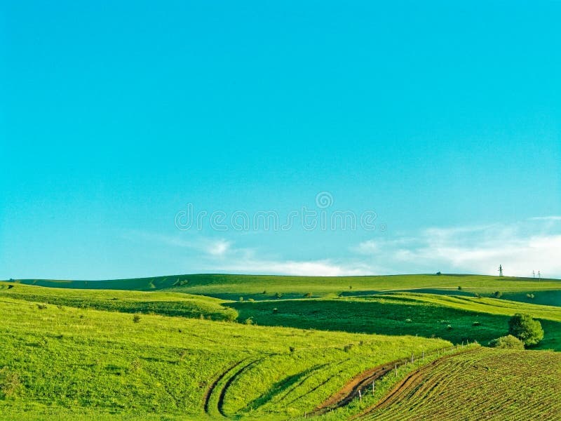 Spring Landscape in the Mountains. Crops, Grassy Fields and Hills ...