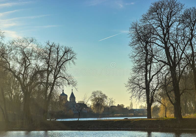 Spring Landscape with Small Town at River Bank Stock Image - Image of ...