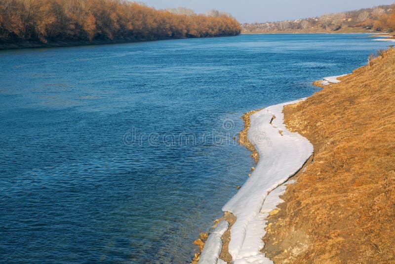 Spring Landscape with Snow on the Riverside Stock Image - Image of ...