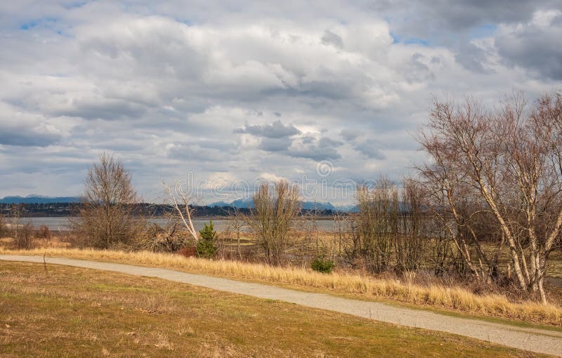 Spring Landscape with Trees and Blue Sky with White Clouds. a Footpath ...