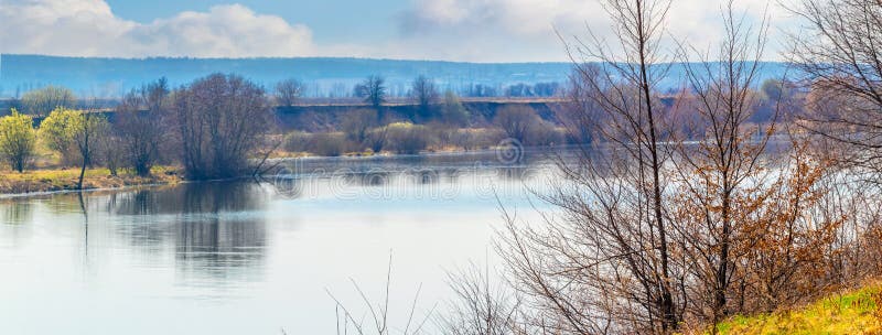 Spring Landscape with Trees by the River, Trees are Reflected in the ...