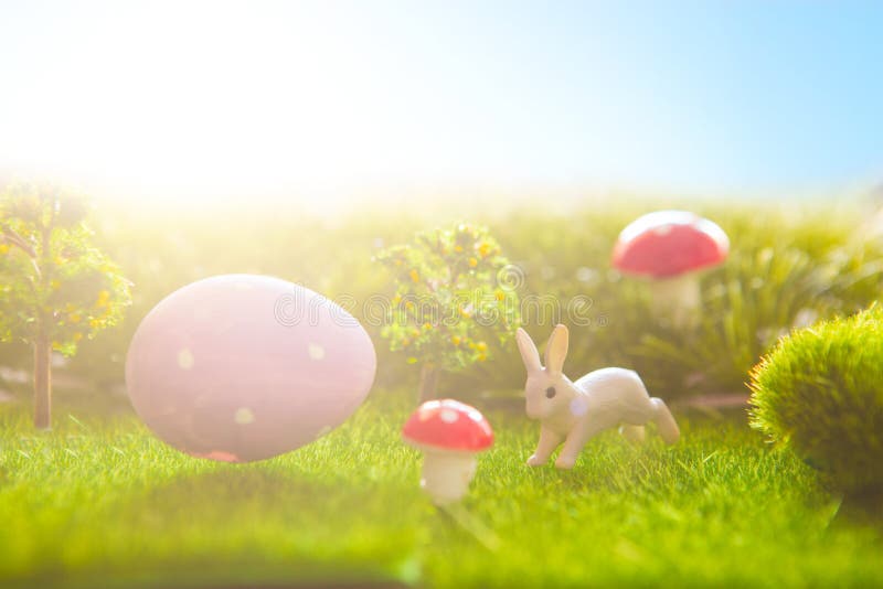 Spring Meadow with Miniature Easter Rabbits and Easter Eggs Stock Photo ...