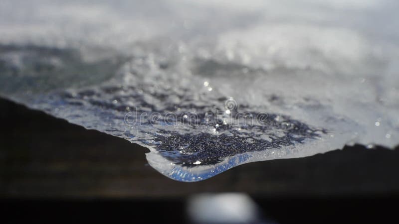 Spring melting icicle stock video. Video of icicle, roof - 275675655