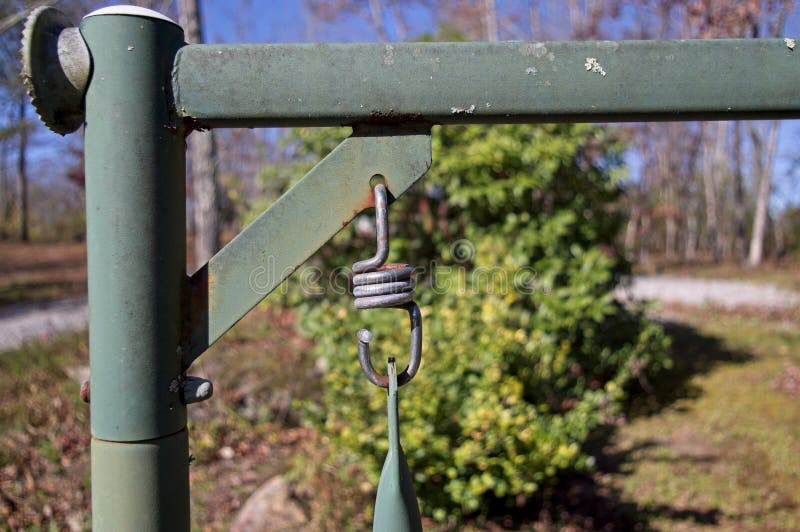 Metal spring for a swing stock image. Image of durable - 344708763