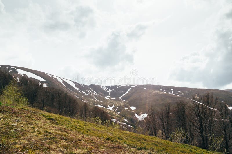 Spring in Mountains. Beautiful Mountain Landscape with Snow on the ...
