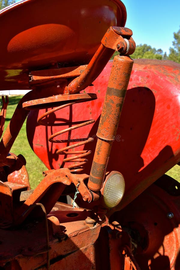 Spring and Shock Absorber of an Old Tractor Seat Stock Image - Image of ...