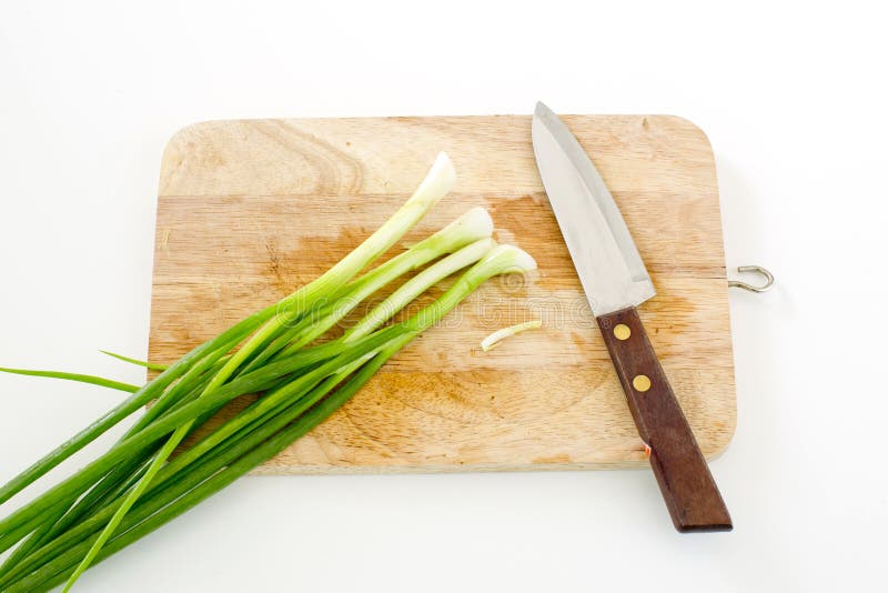 Spring Onion on Cutting Board and Knife Stock Image - Image of green ...